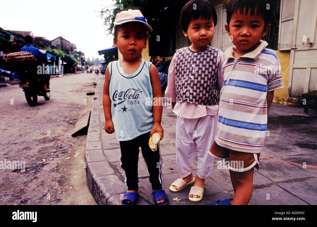 A small street gang of very small gang members hanging out on the ...
