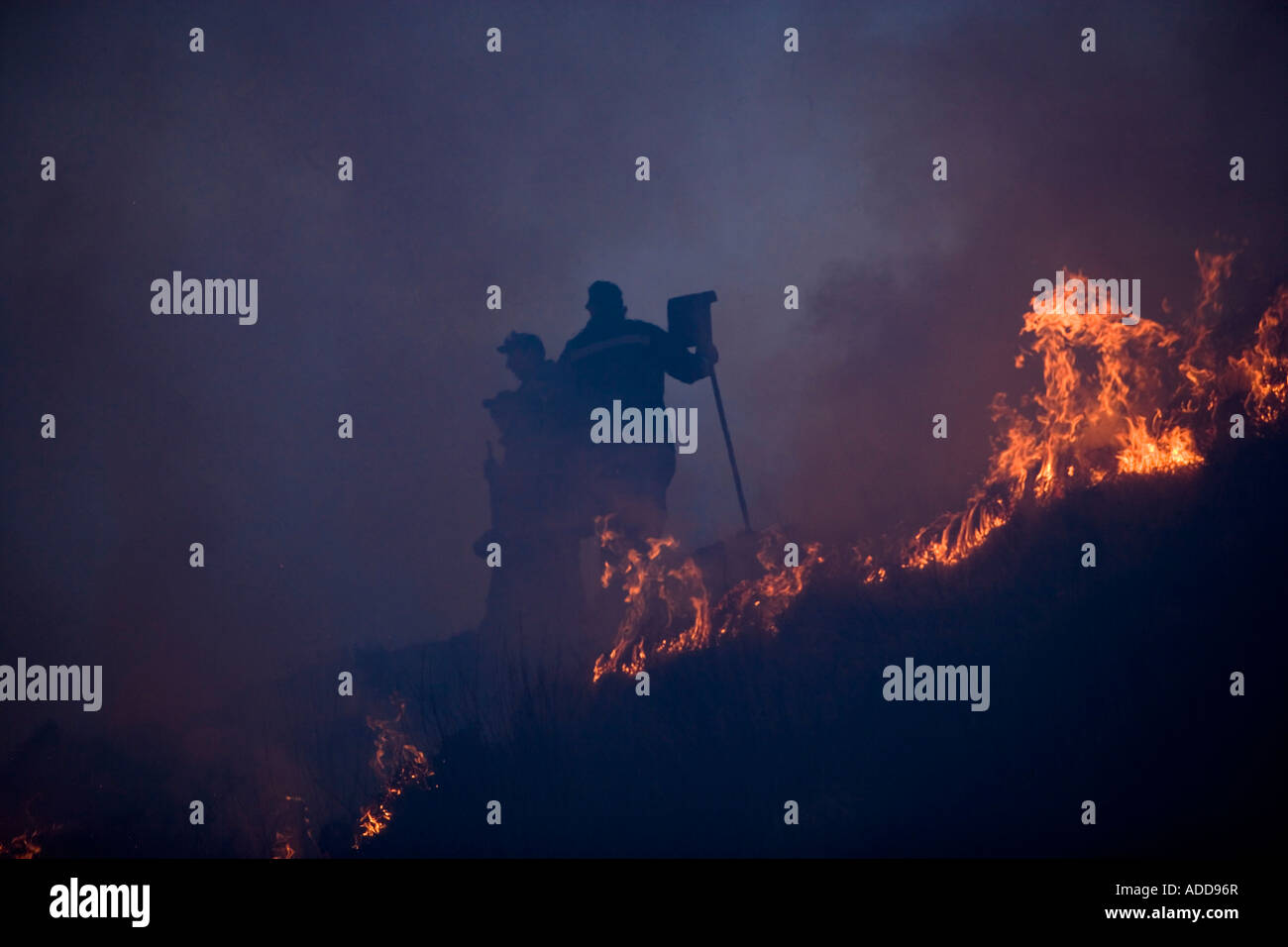 Firemen beating fire hi-res stock photography and images - Alamy