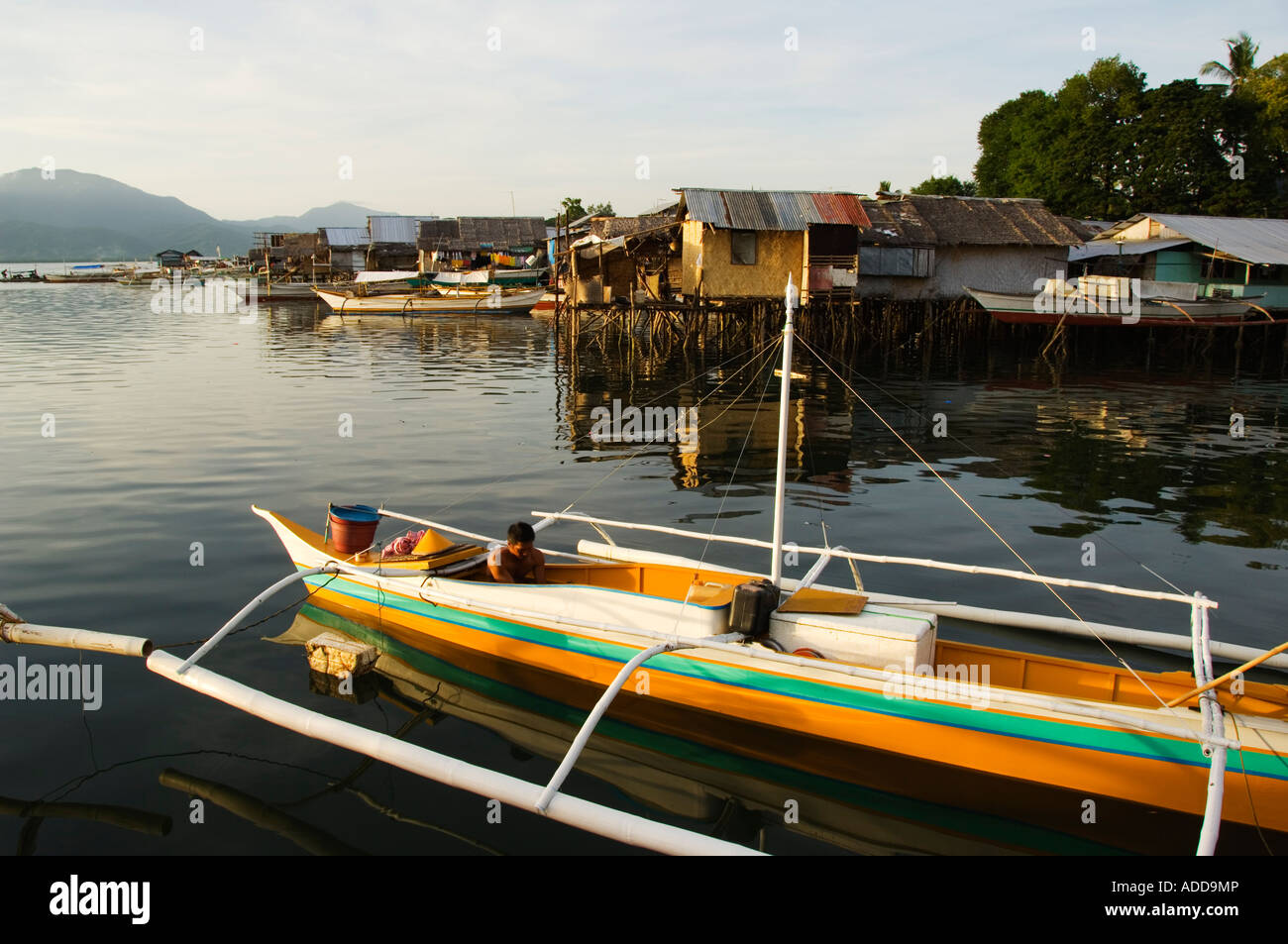 Philippines Luzon Palawan Puerto Princessa Fisherman on Colourful Banka ...