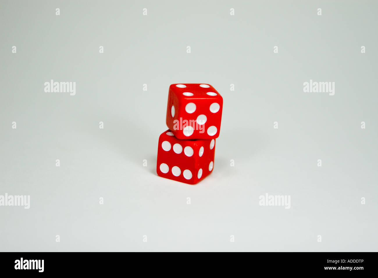 Two Red and White Dice Stacked Stock Photo - Alamy