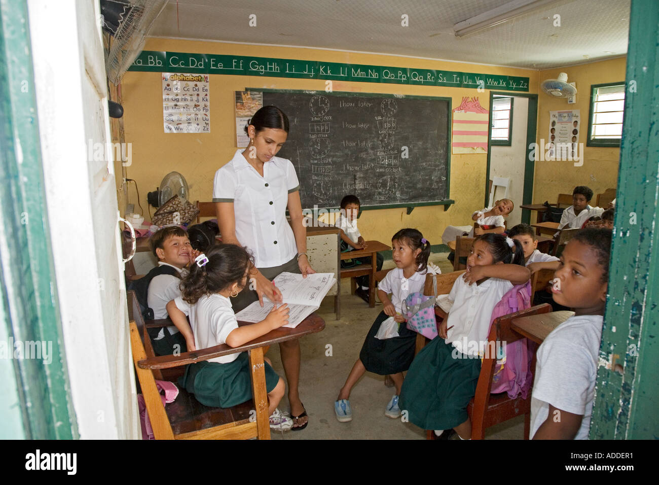 San Pedro Belize A teacher and students in a classroom at St Peter s ...