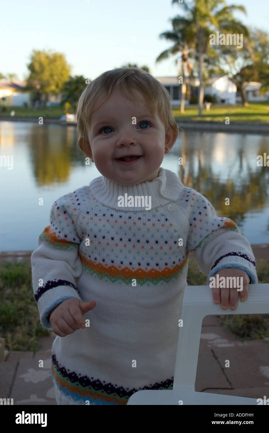 Young Female Child Standing Stock Photo - Alamy