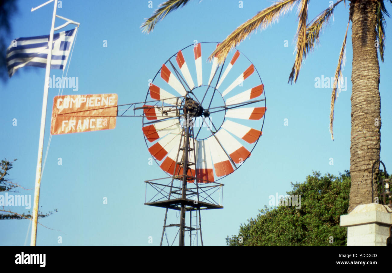 greek flag french windmill tropical palm number 1635 Stock Photo - Alamy