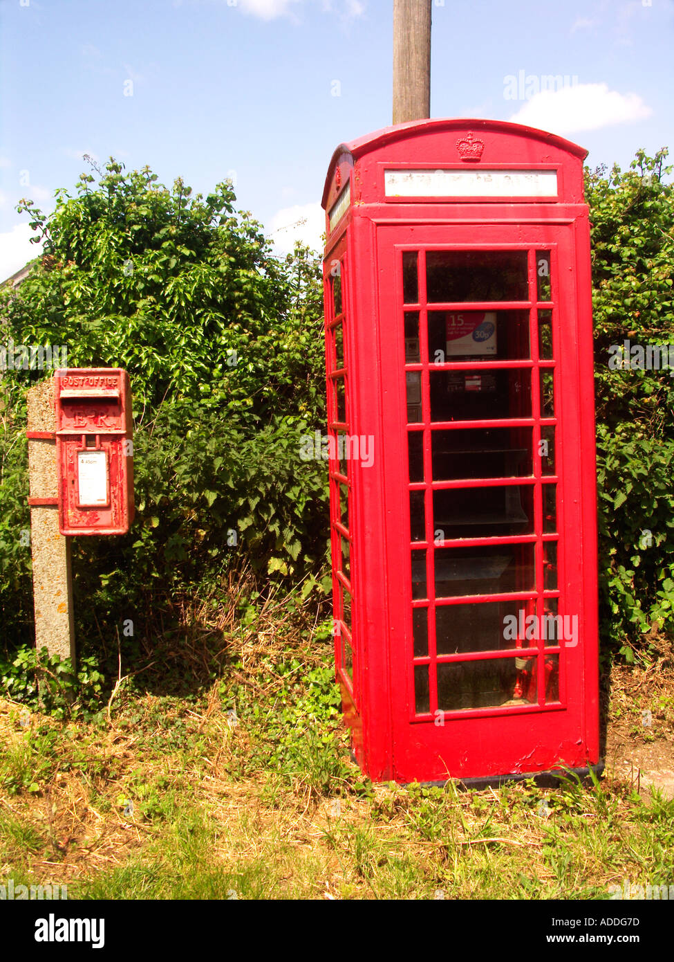 Red telephone box and post box in countryside Suffolk England Stock ...