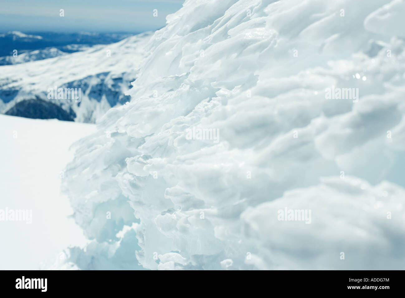 Ice formation, mountain range in background Stock Photo - Alamy