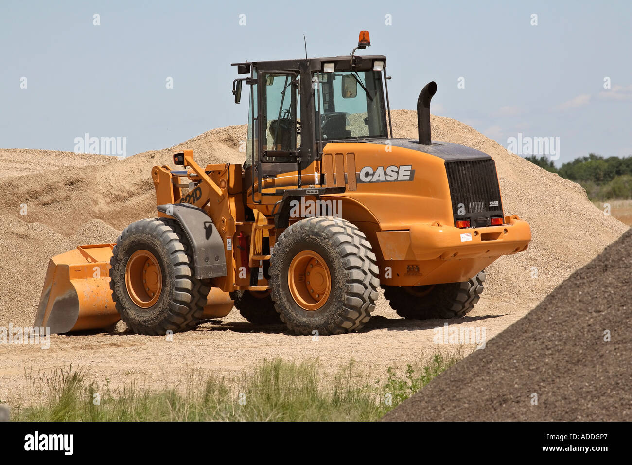 Front-end Loader lying idle in a gravel dump in scenic Saskatchewan ...