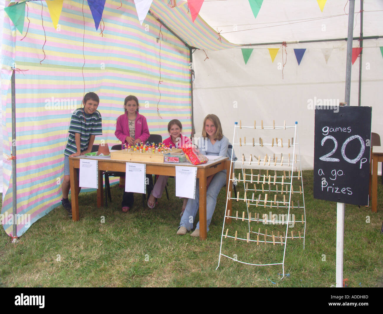 Children running a games stall at Butley Flower Show fete Suffolk ...