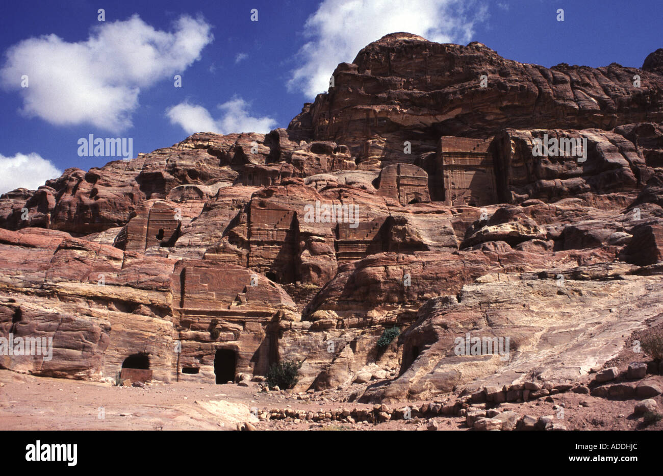 Tombs carved into the the red sandstone cliffs of Petra Jordan Stock ...