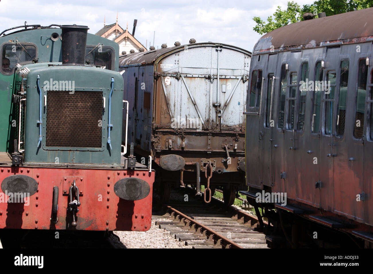 Train pulls into platform of preserved railway station Stock Photo - Alamy