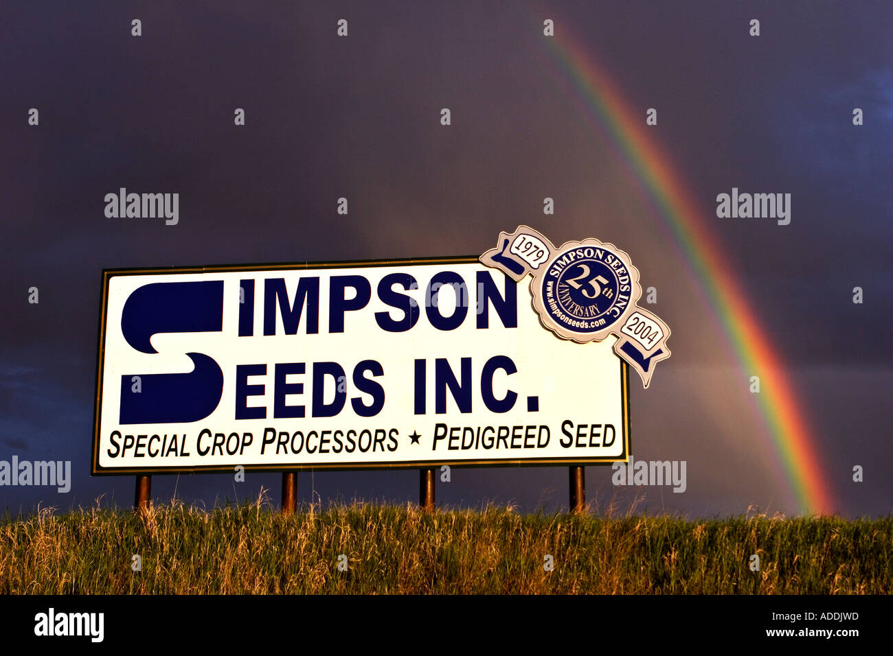 Rainbow touching down behind the Simpson Seed sign in scenic ...
