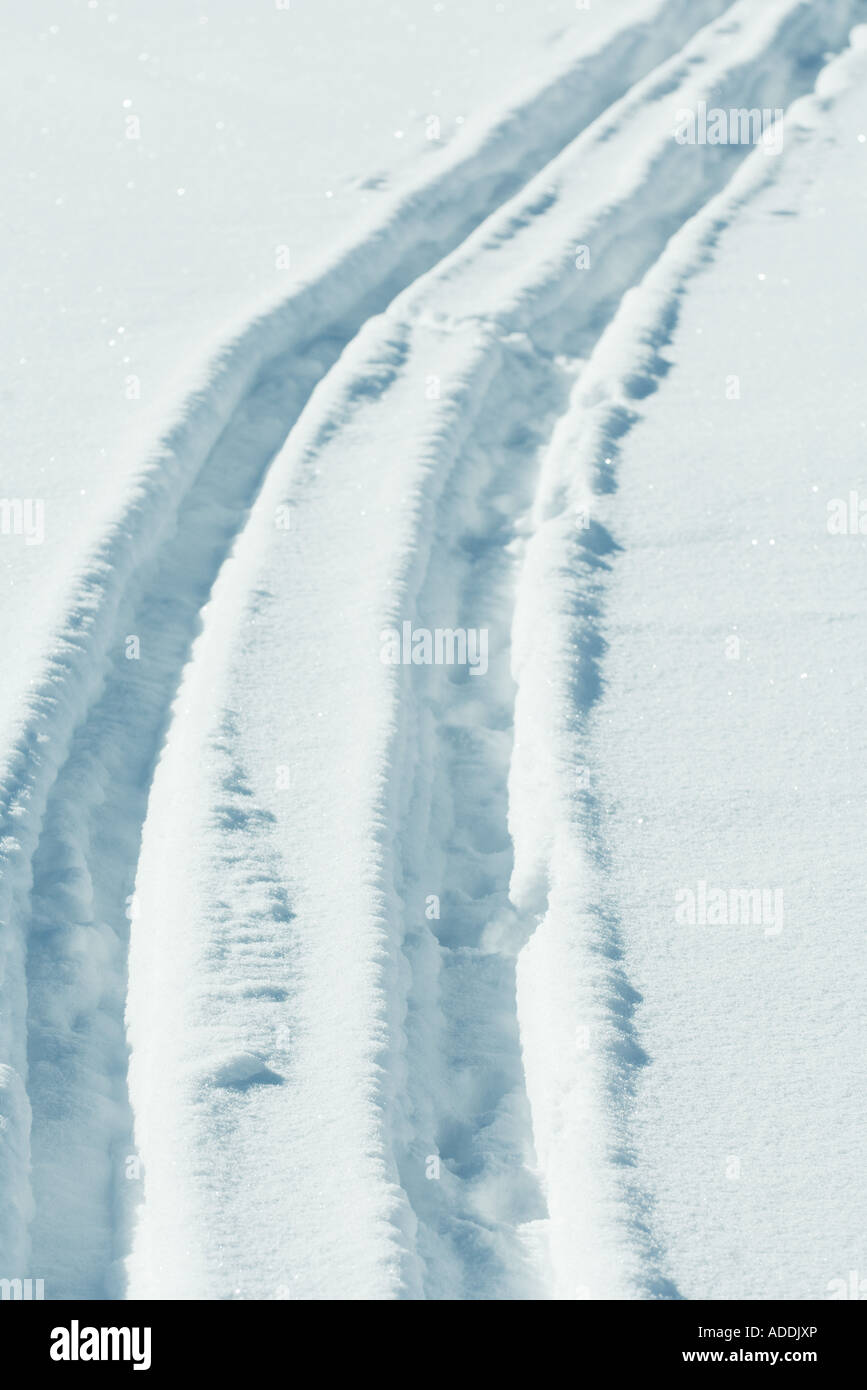 Tire tracks in snow Stock Photo - Alamy
