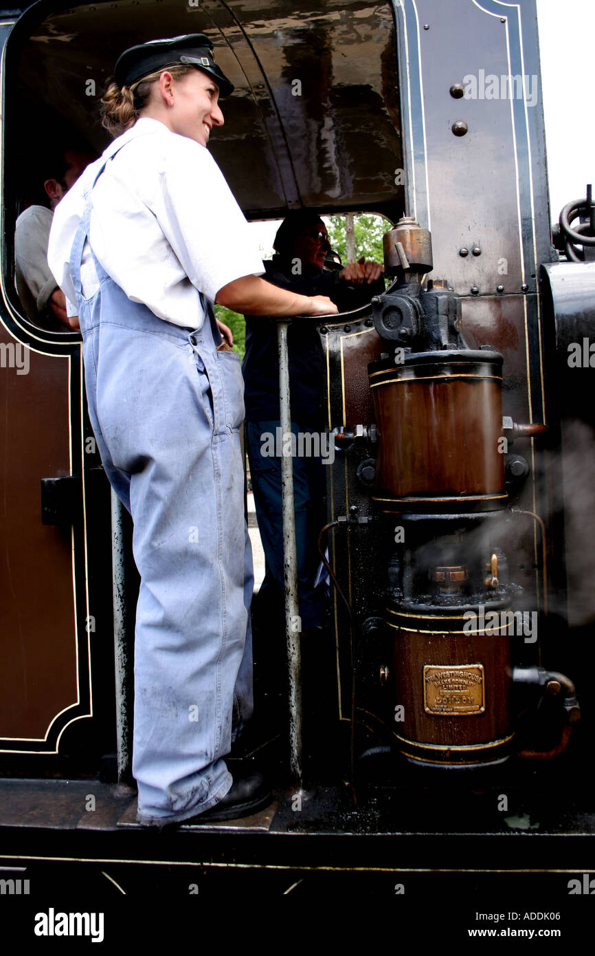 Female locomotive driver at the Bluebell Railway Horsted Keynes Sussex ...