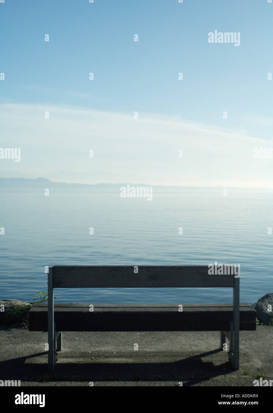 Bench overlooking lake Stock Photo - Alamy