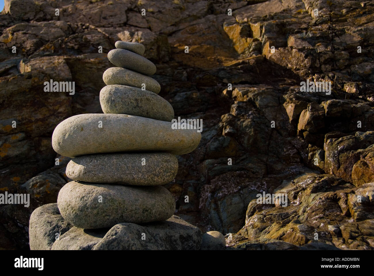 A Pile of Seven Pebbles Balancing Stock Photo - Alamy