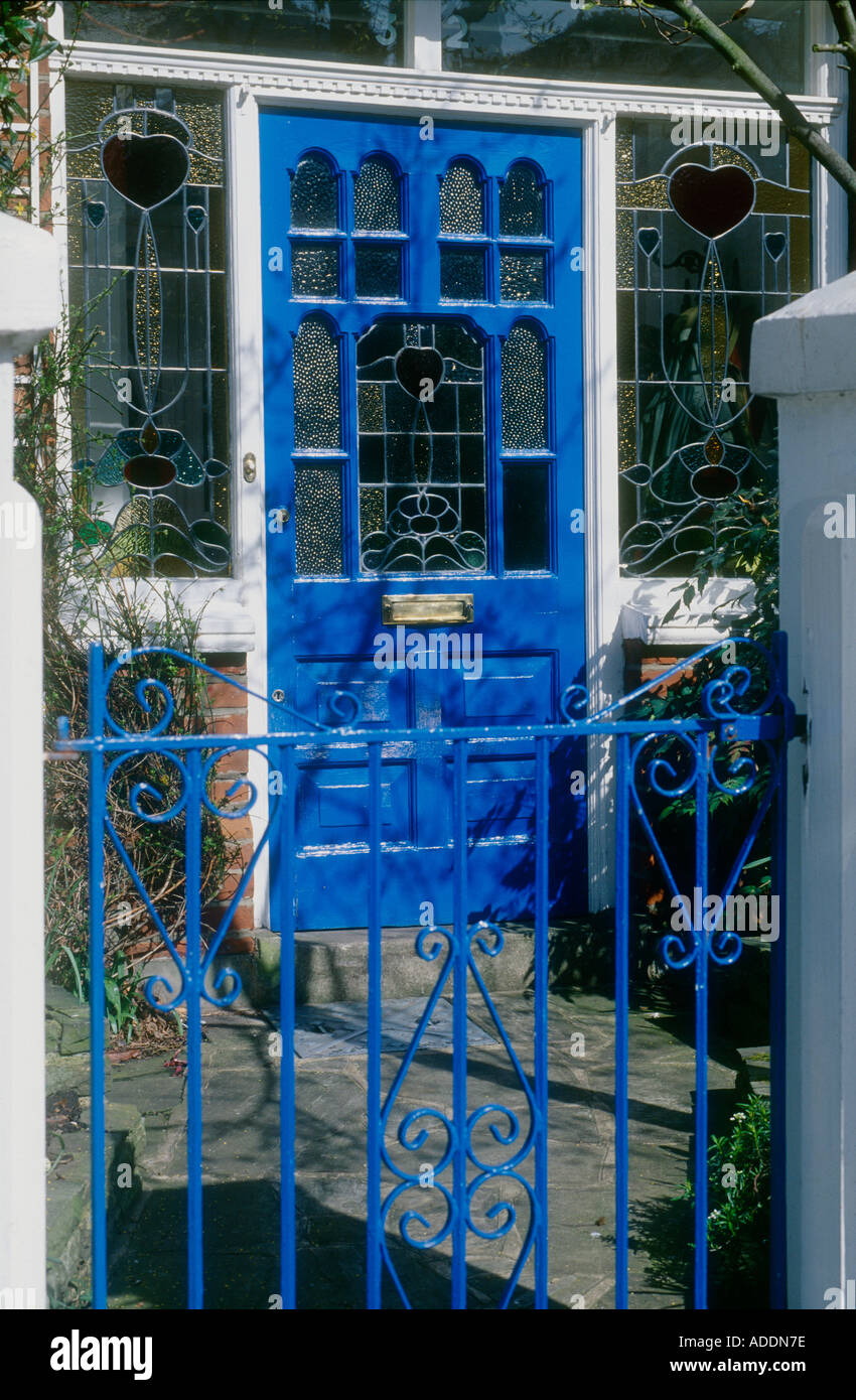 Blue front gate door Edwardian house West London Stock Photo - Alamy
