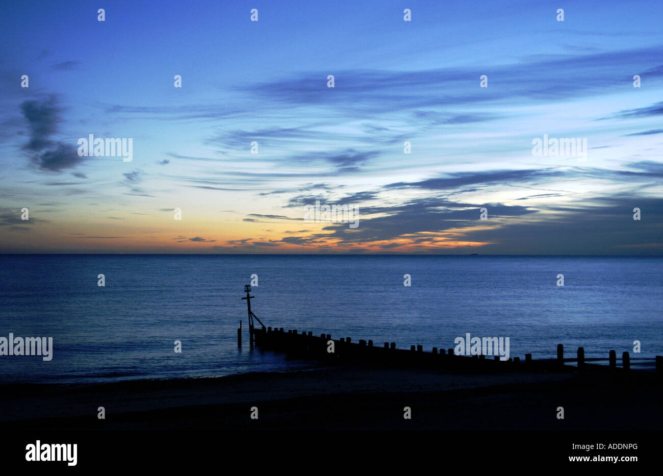 Sunrise over the sea at Walcott, Norfolk, UK Stock Photo - Alamy