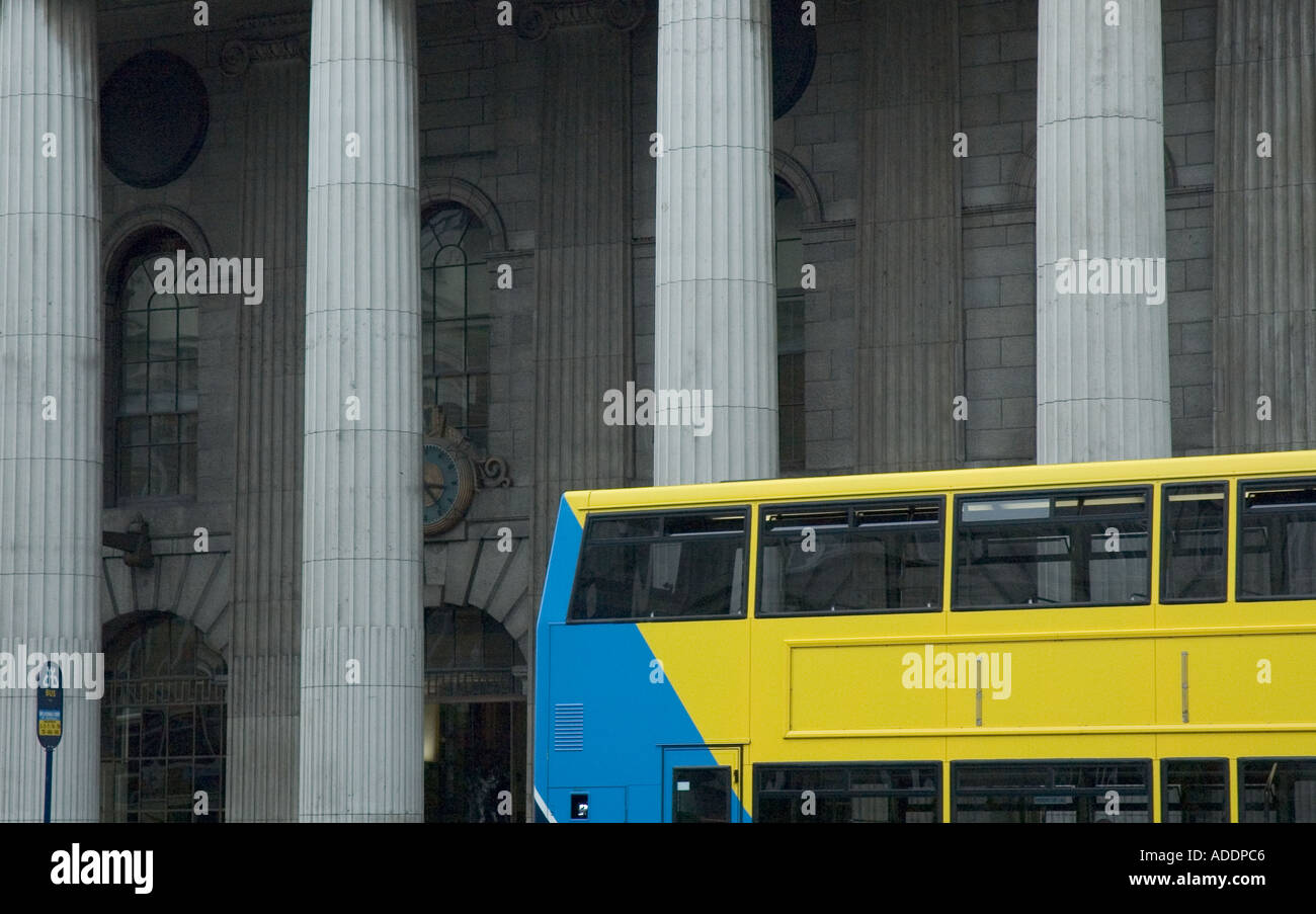 A double decker bus pulls up in front of the pillars of the GPO in ...