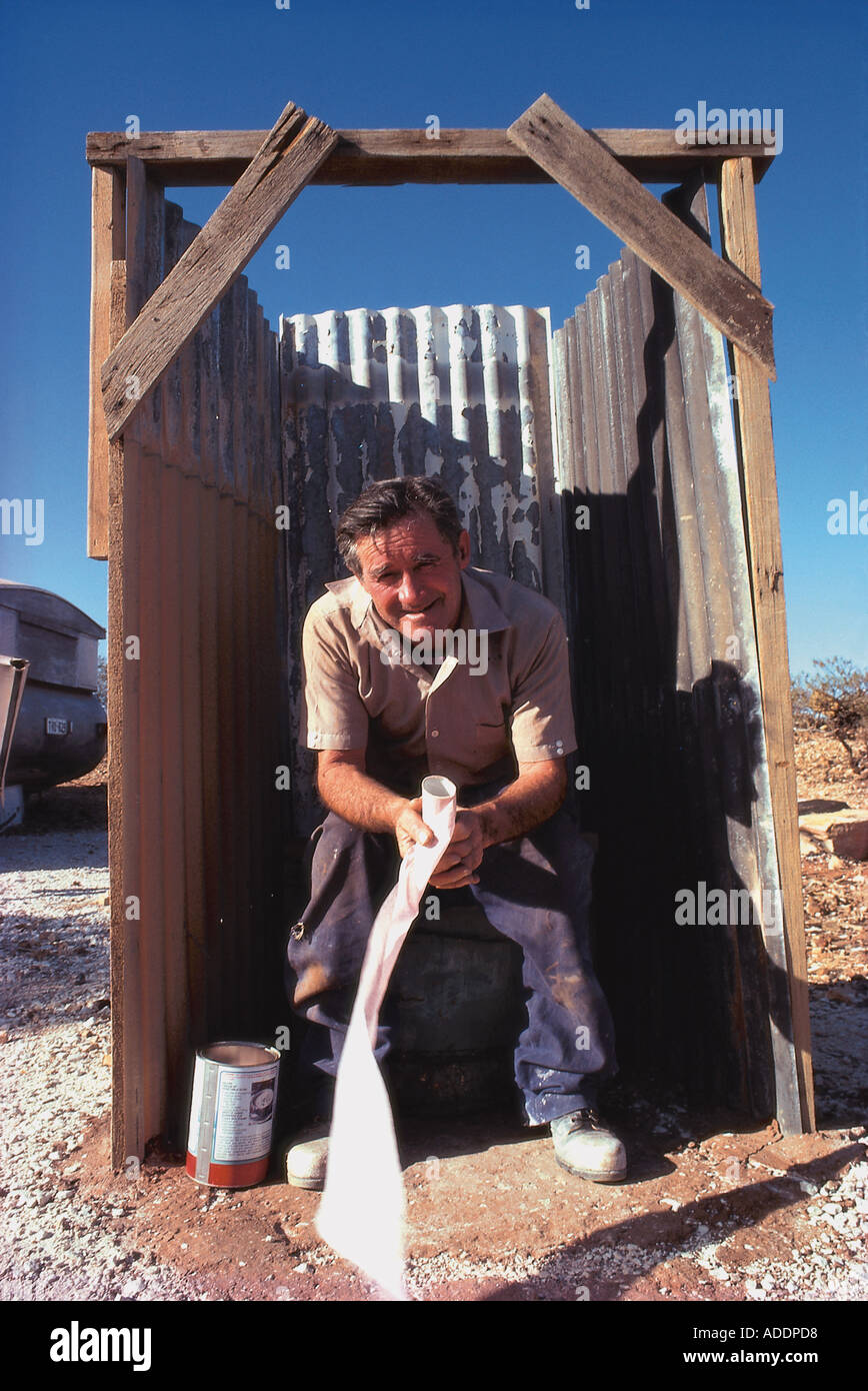 Opal miner on outdoor shed toilet, outback, Australia Stock Photo - Alamy