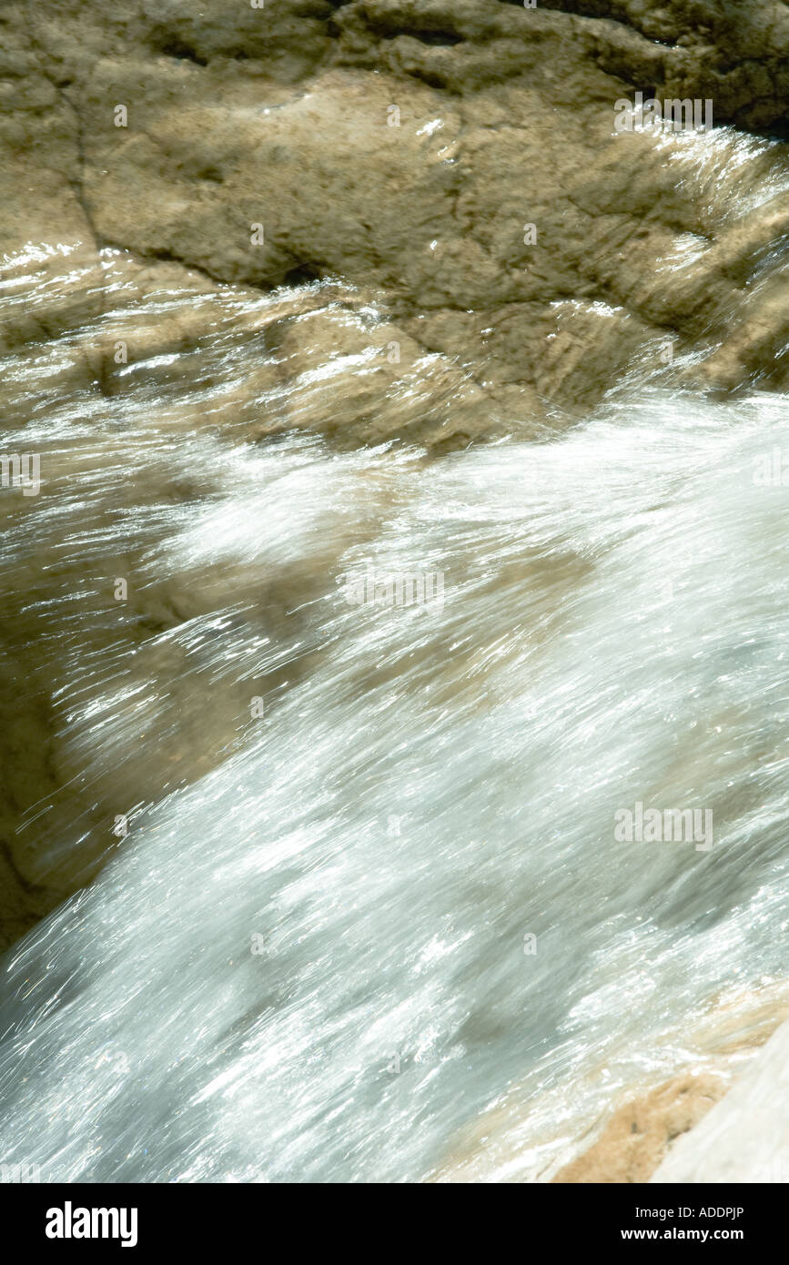 Water running over rock, close-up Stock Photo - Alamy