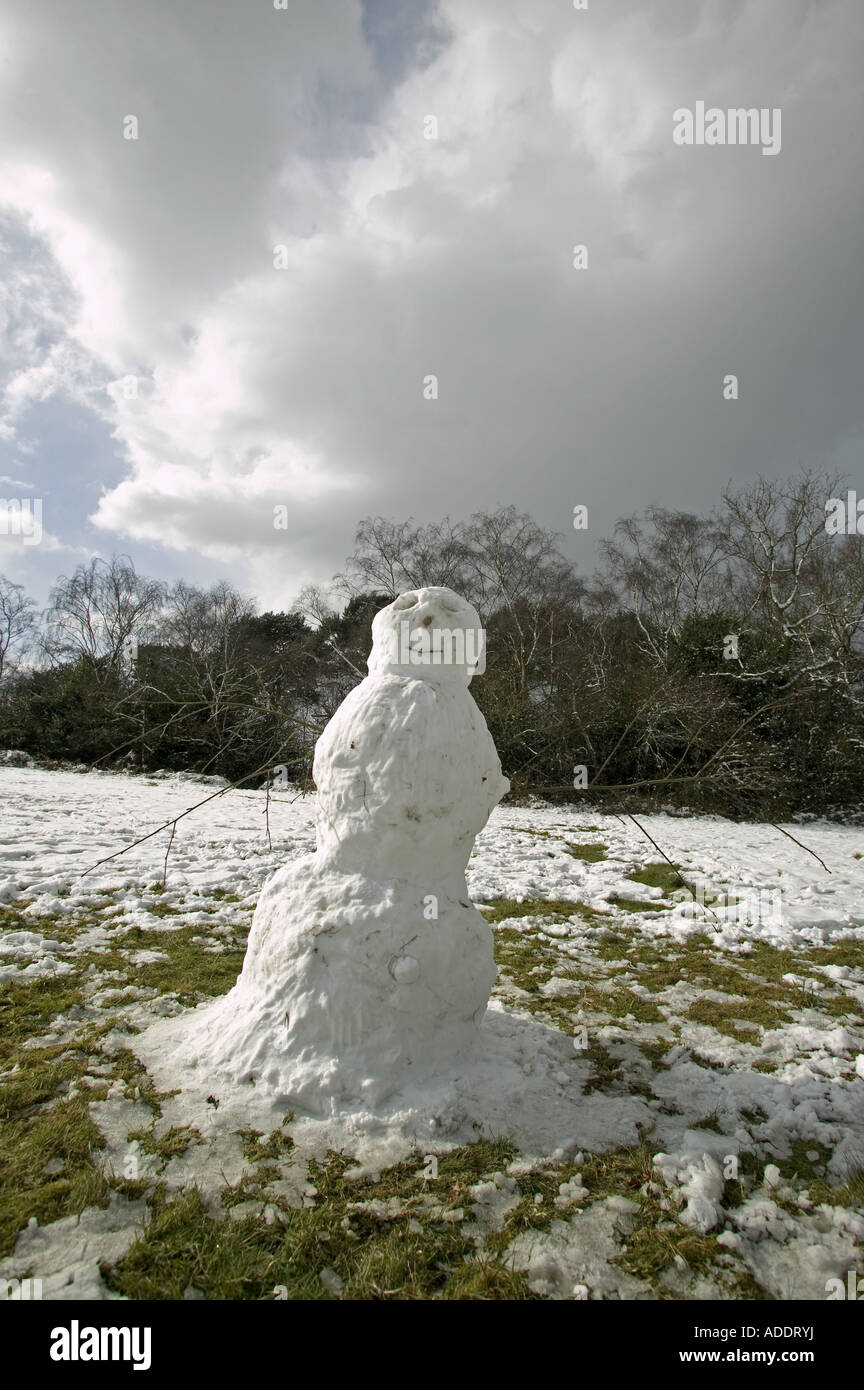 A Snowman on a thawing field Stock Photo - Alamy