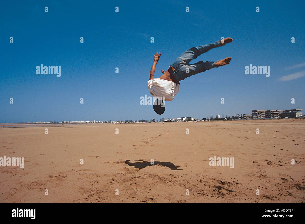 Rear view african man doing hi-res stock photography and images - Alamy