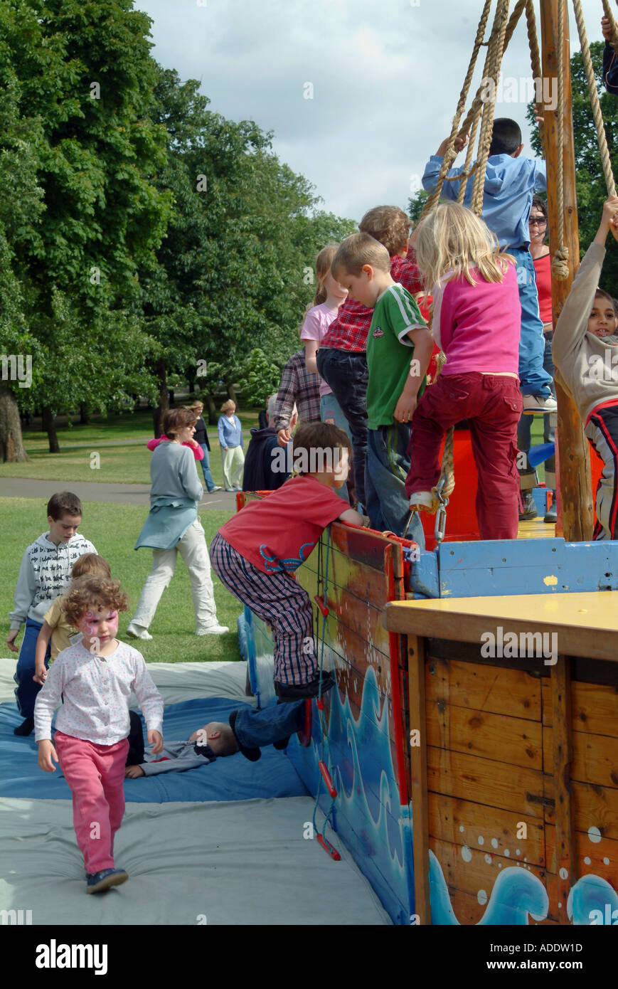 CHILDREN PLAYING IN PLAYGROUND Stock Photo - Alamy