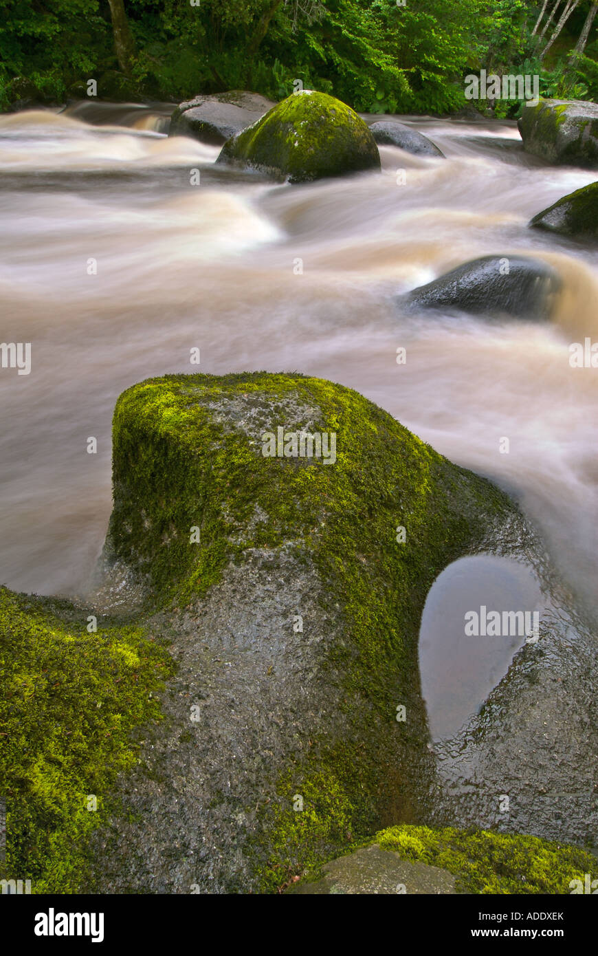 Curved rocks and flowing water abstract Stock Photo - Alamy