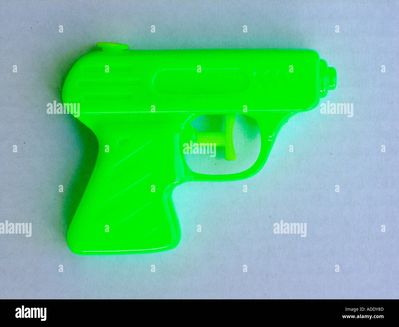 Still Life of a Green Plastic Water Gun Squirt Gun Stock Photo - Alamy