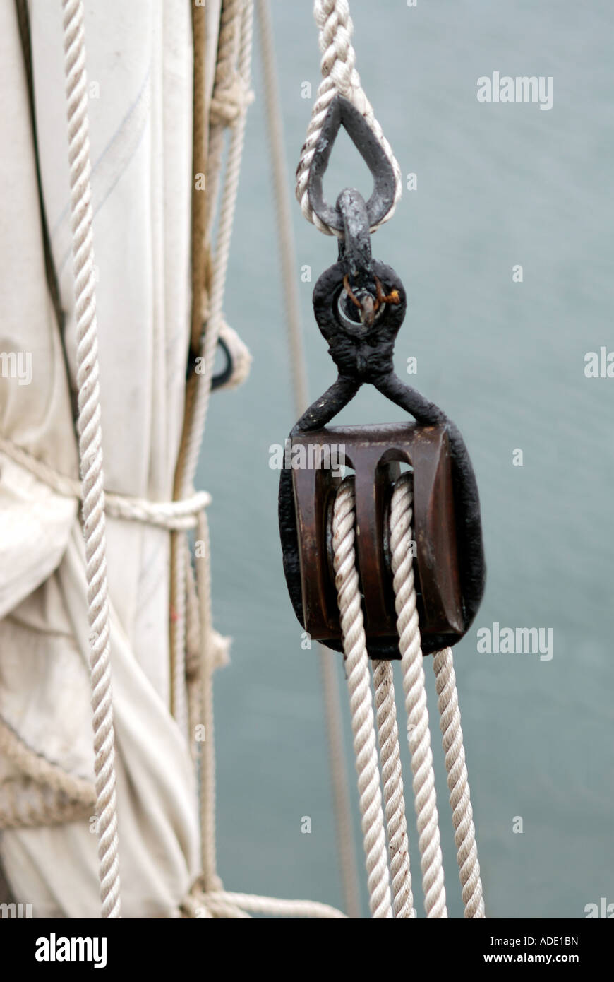 Rope and pulley on a sailing ship Stock Photo - Alamy