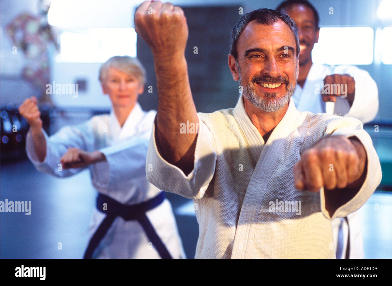 Karate instructor teaching karate class Stock Photo - Alamy