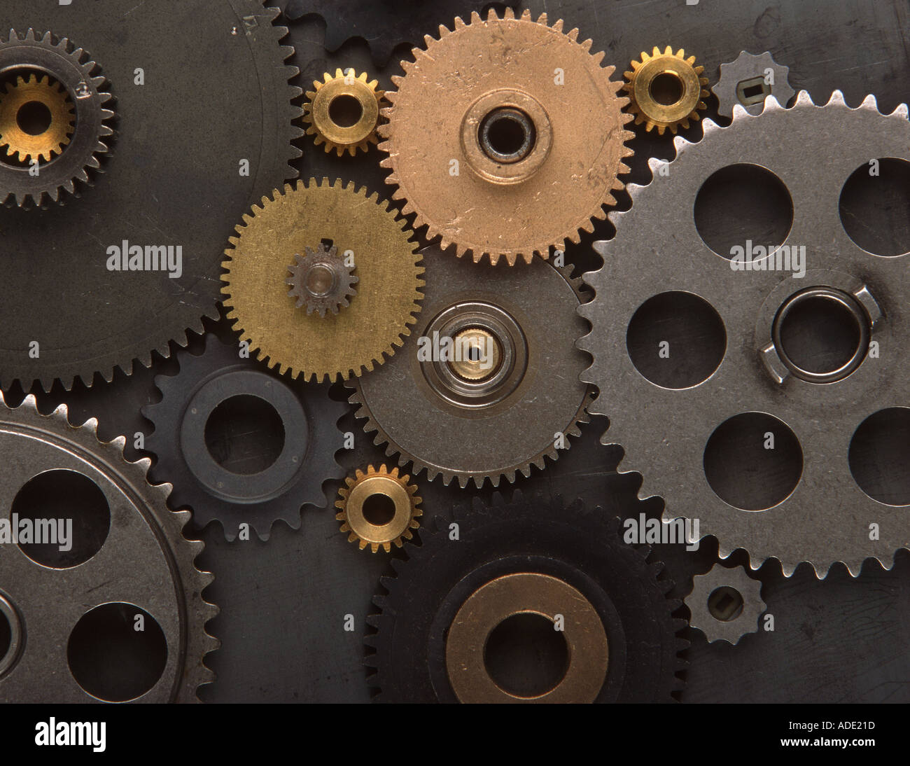 A grouping or collage of new circular industrial metal gears of varying ...