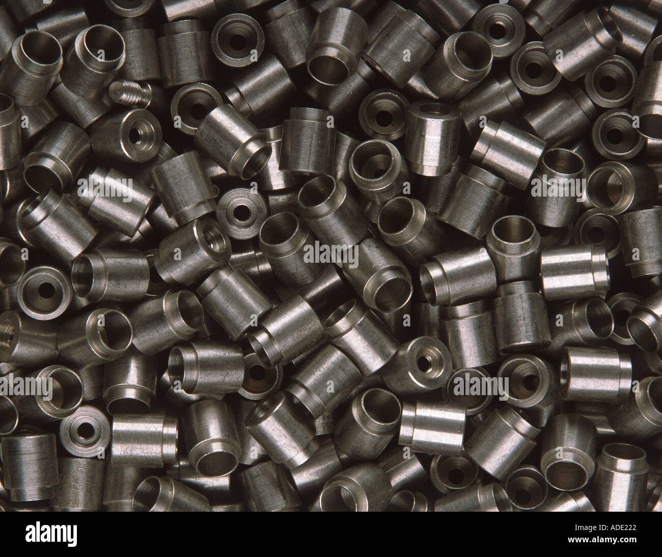 A random collage or background of small silver industrial casing like ...