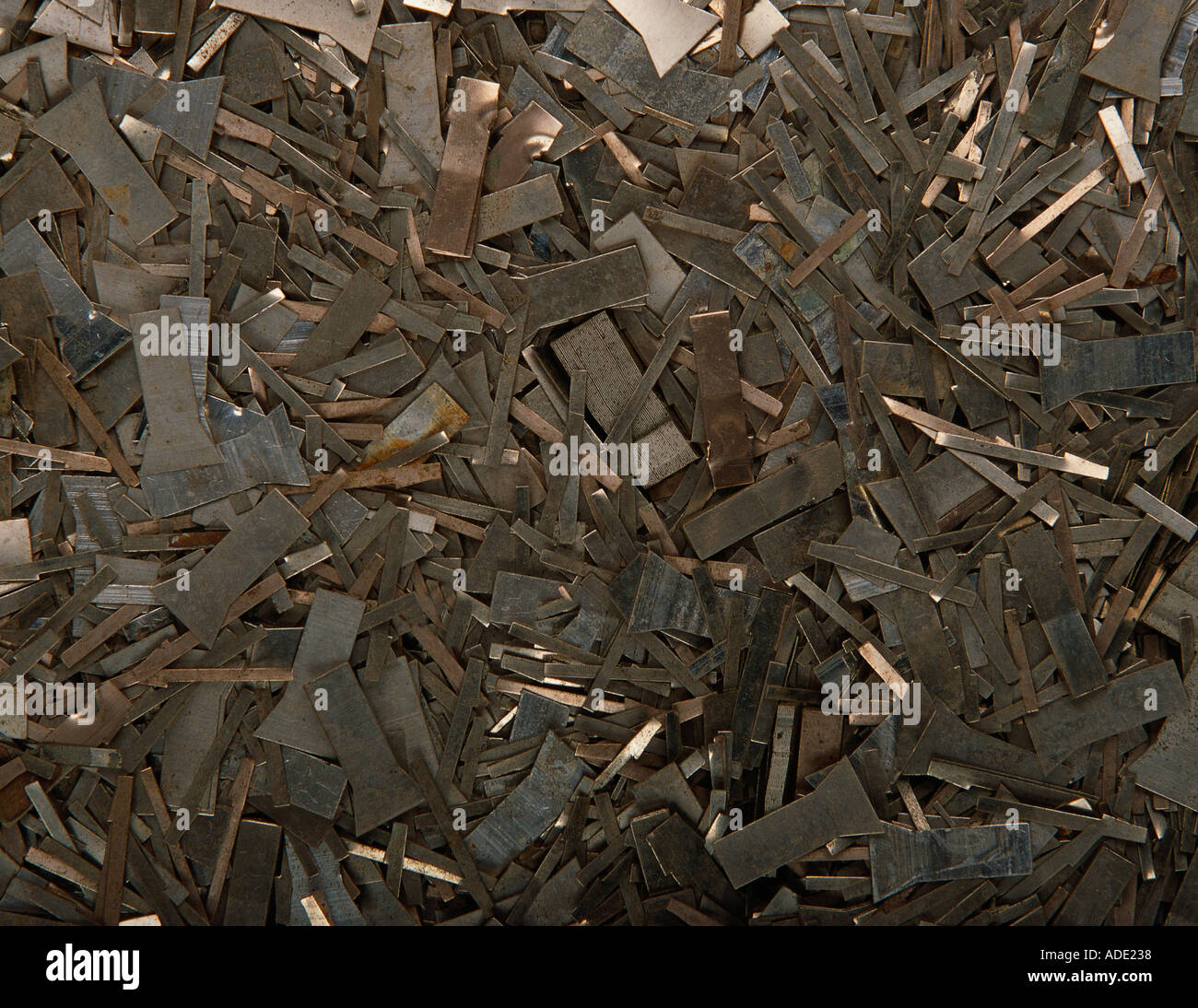 A random collage or background of shiny sharp silver colored metal ...