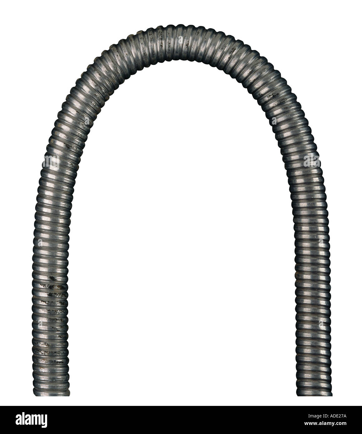 A piece of u shaped ribbed metal tubing or pipe Stock Photo - Alamy