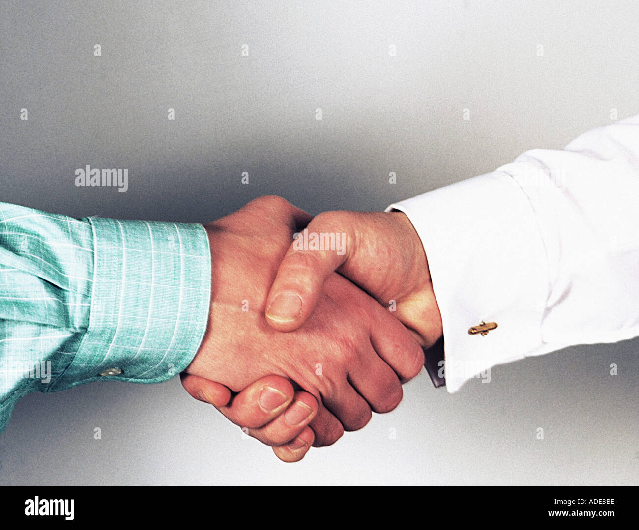Symbolic handshake hi-res stock photography and images - Alamy