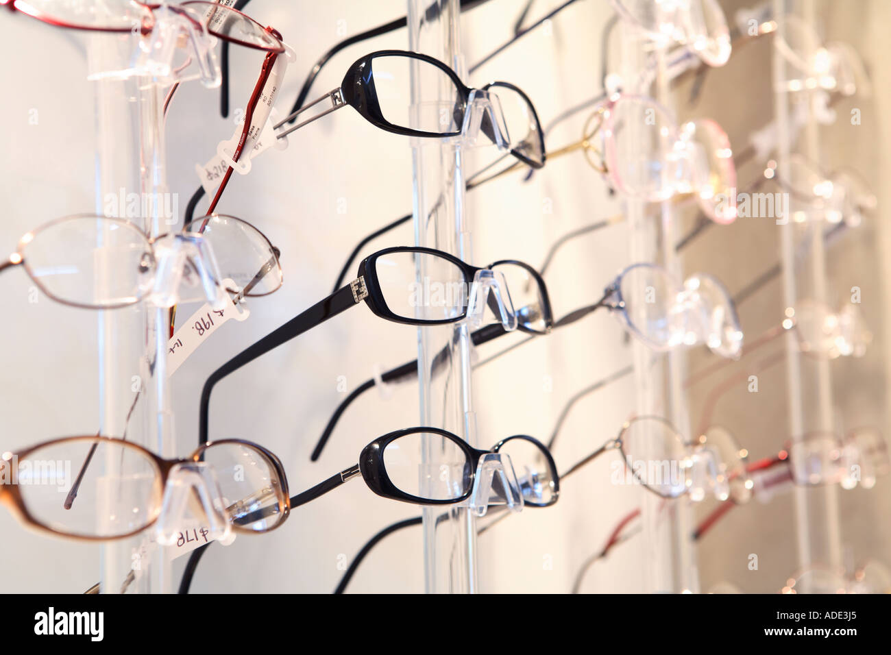 Glasses on display at store Stock Photo - Alamy