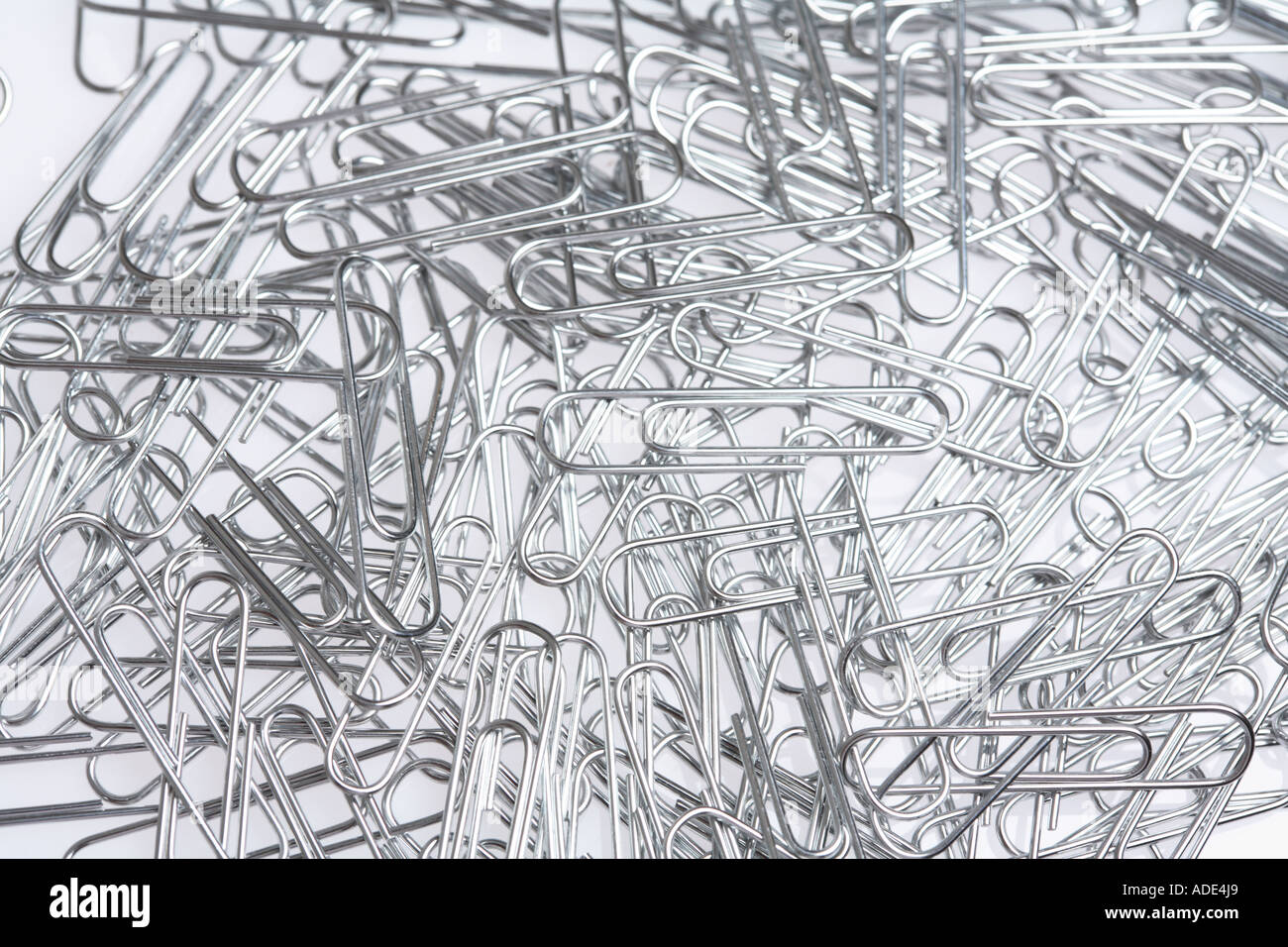 Paperclip background texture Stock Photo - Alamy