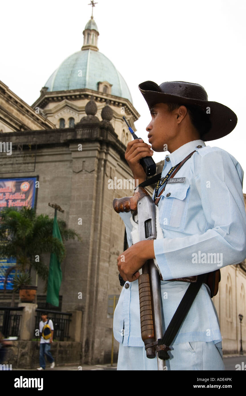 Philippines Manila Police Man near Manila Cathedral Stock Photo - Alamy