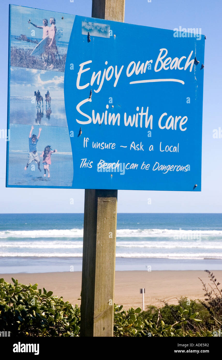Warning sign at Glinks Gully beach on the west coast of Northland, New ...