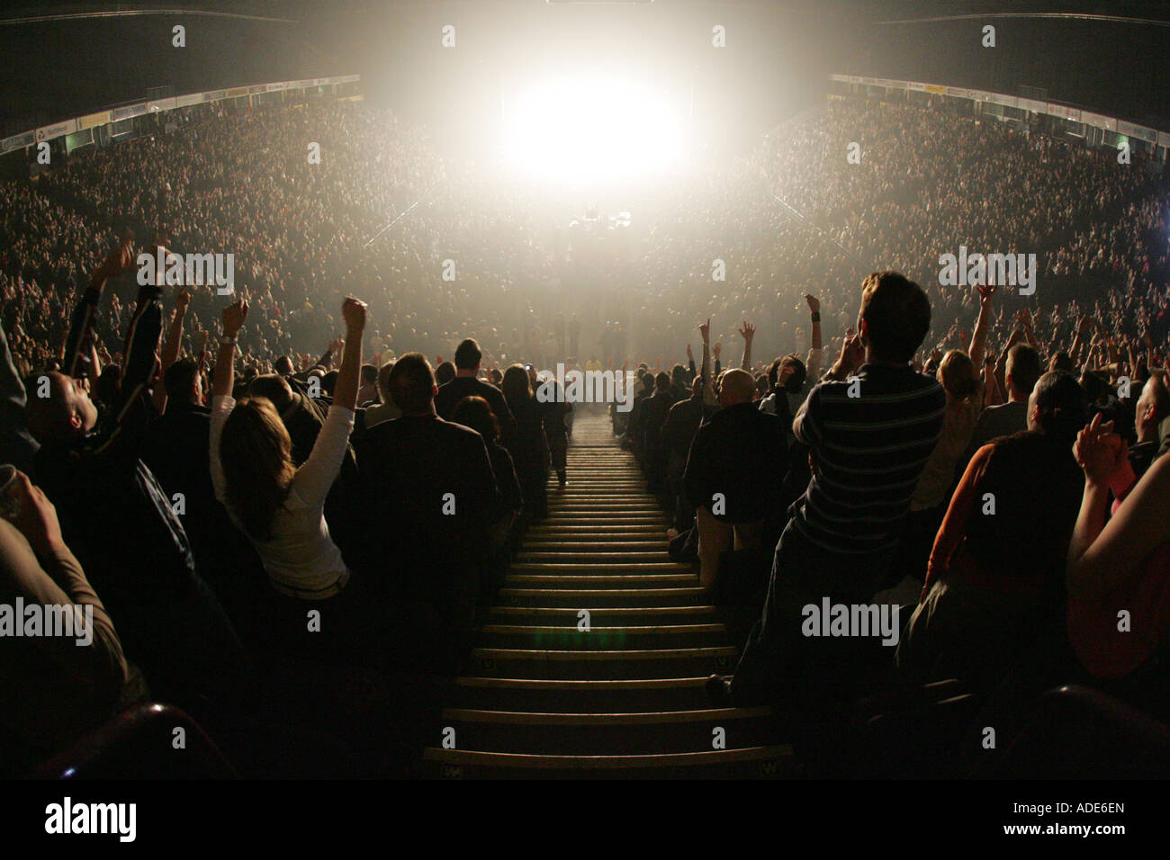 Huge crowd and bright lights at a concert at the Manchester Evening ...