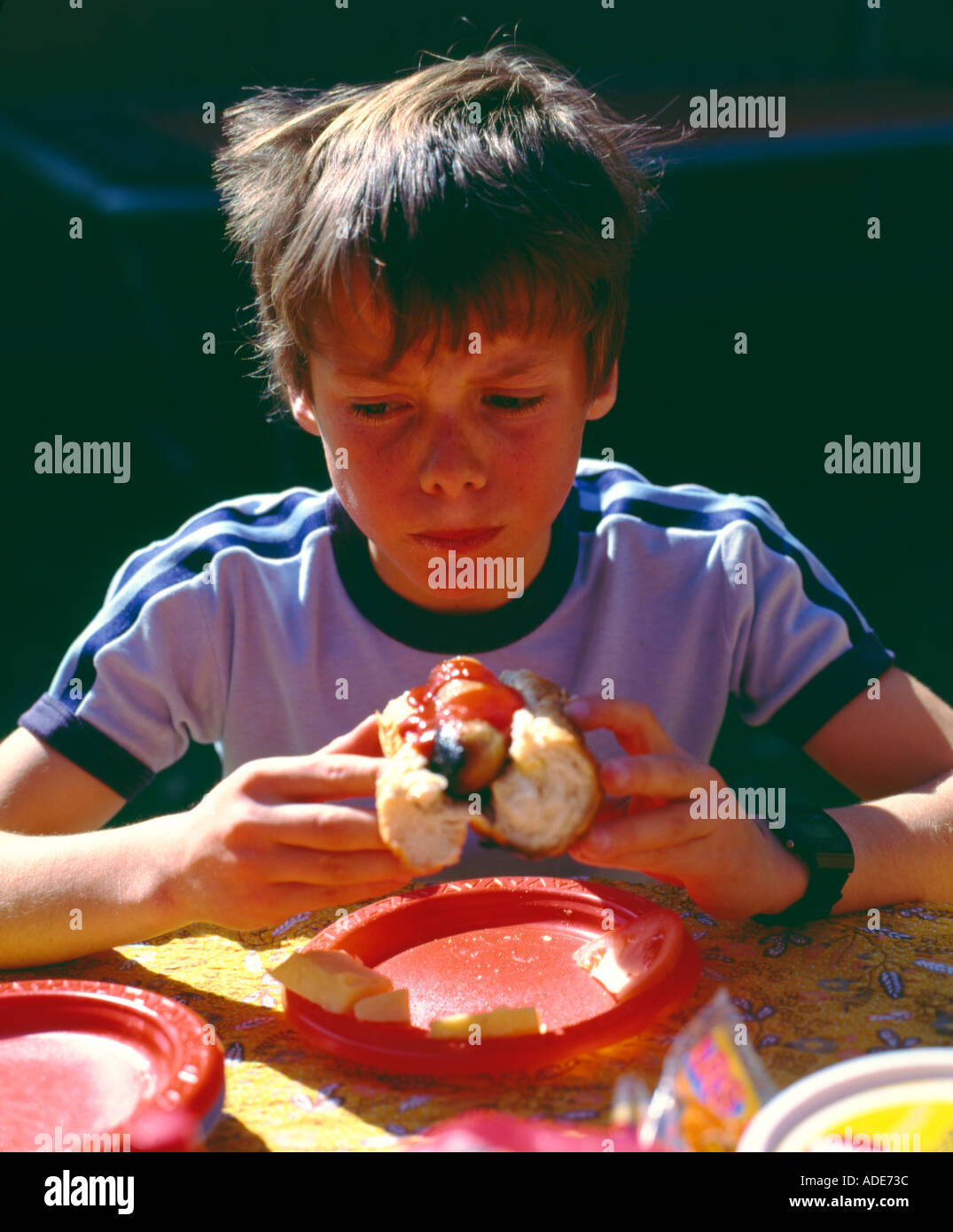 Boy with hot dog Stock Photo - Alamy