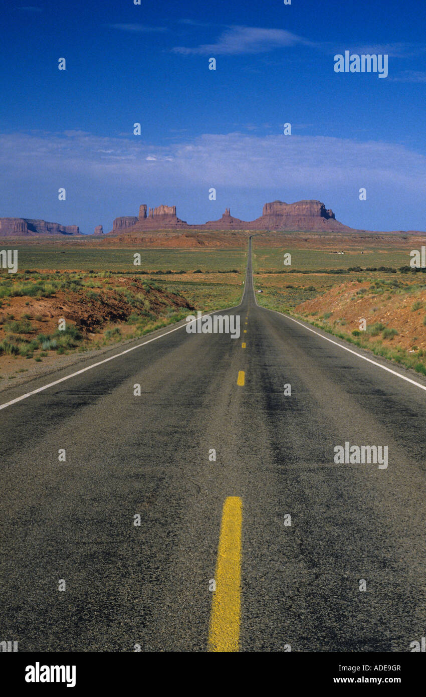 Highway 163 leading into Monument Valley with rock formations in ...