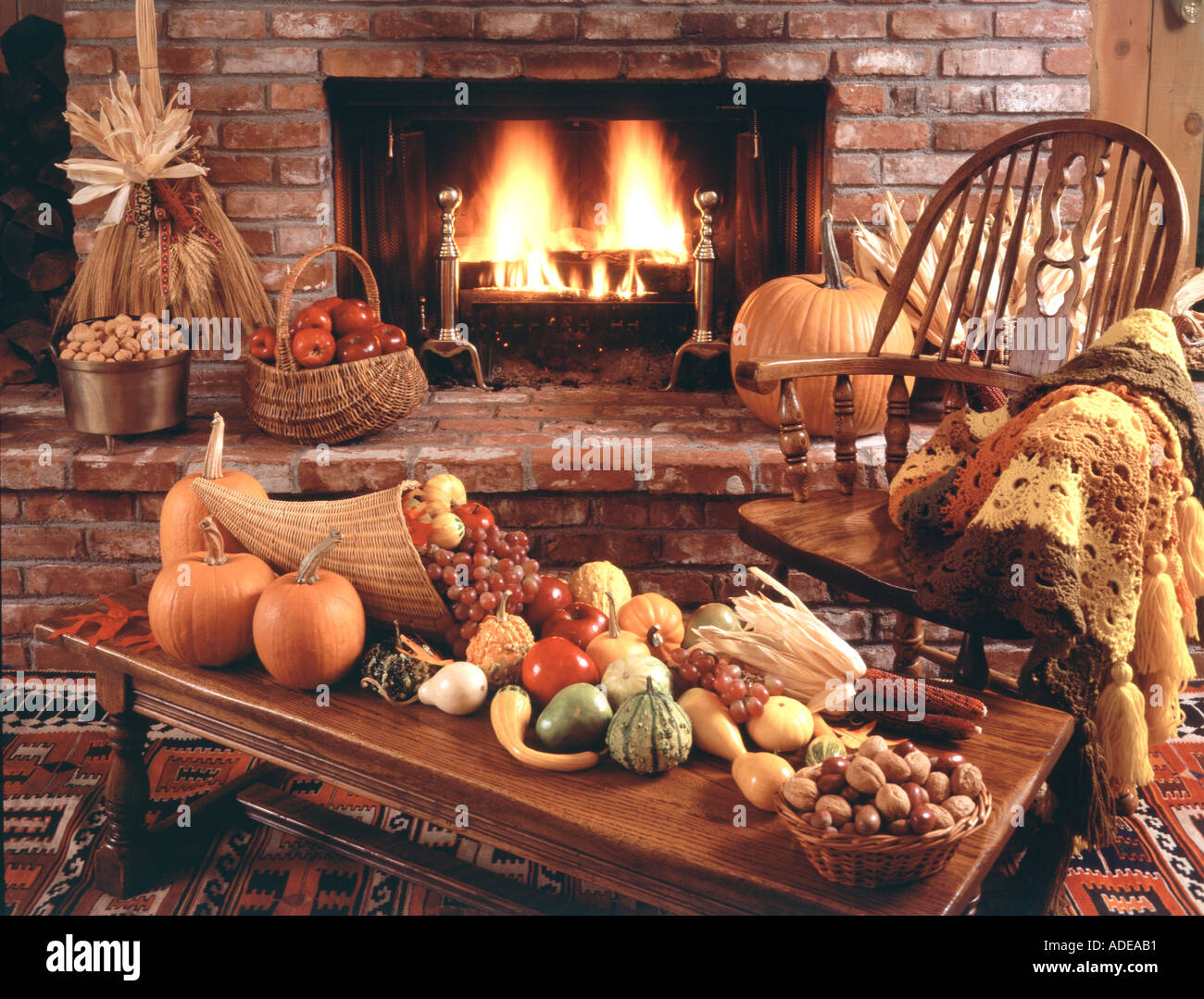 Harvest still life with fireplace ablaze Stock Photo - Alamy