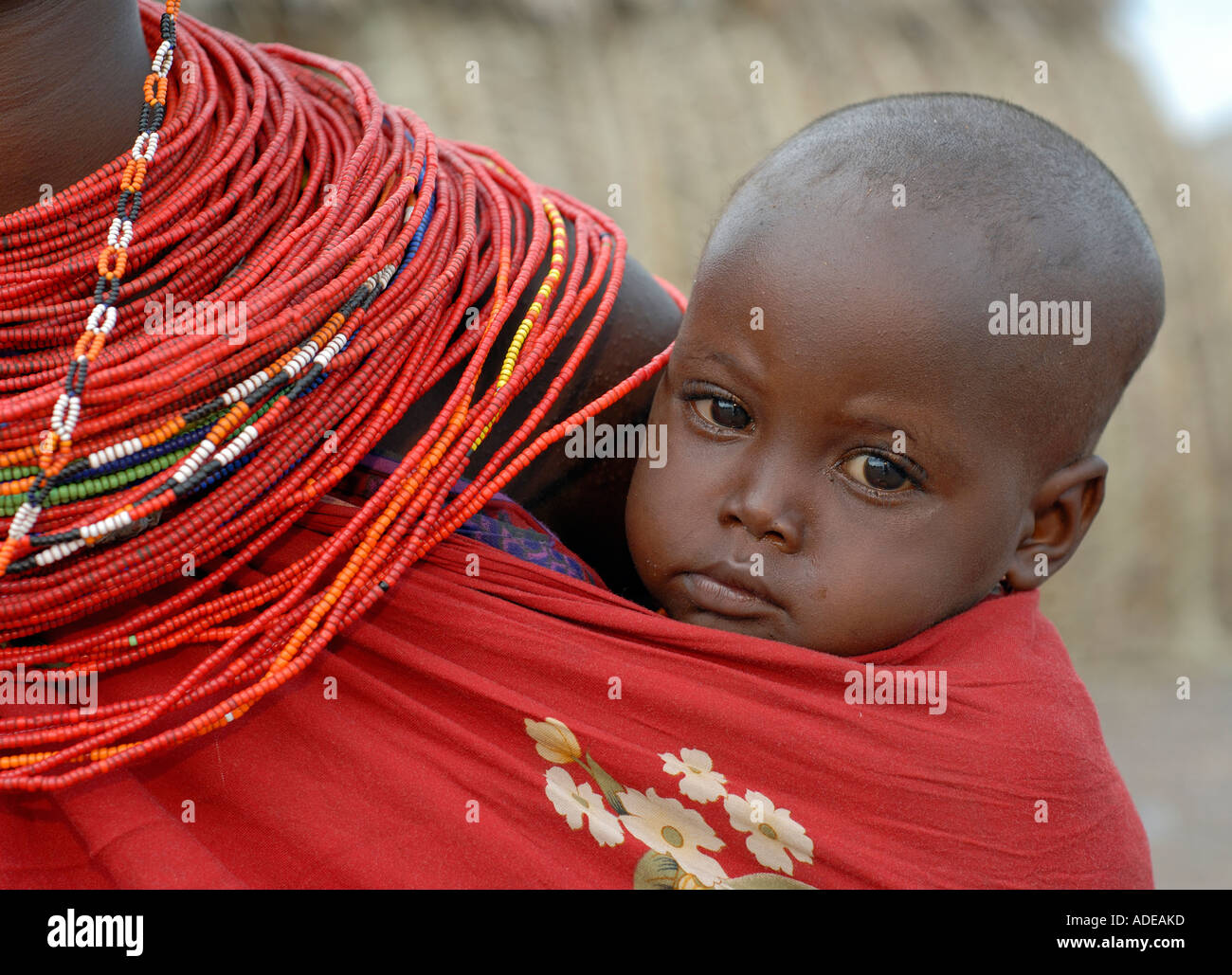 Little El Molo child in mother s arms El Molo bay of Lake Turkana ...