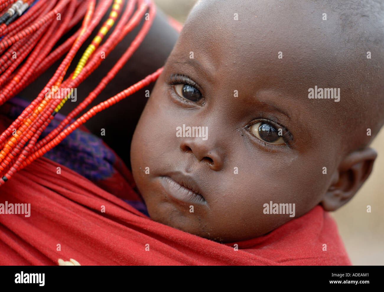 Little El Molo child in mother s arms El Molo bay of Lake Turkana ...