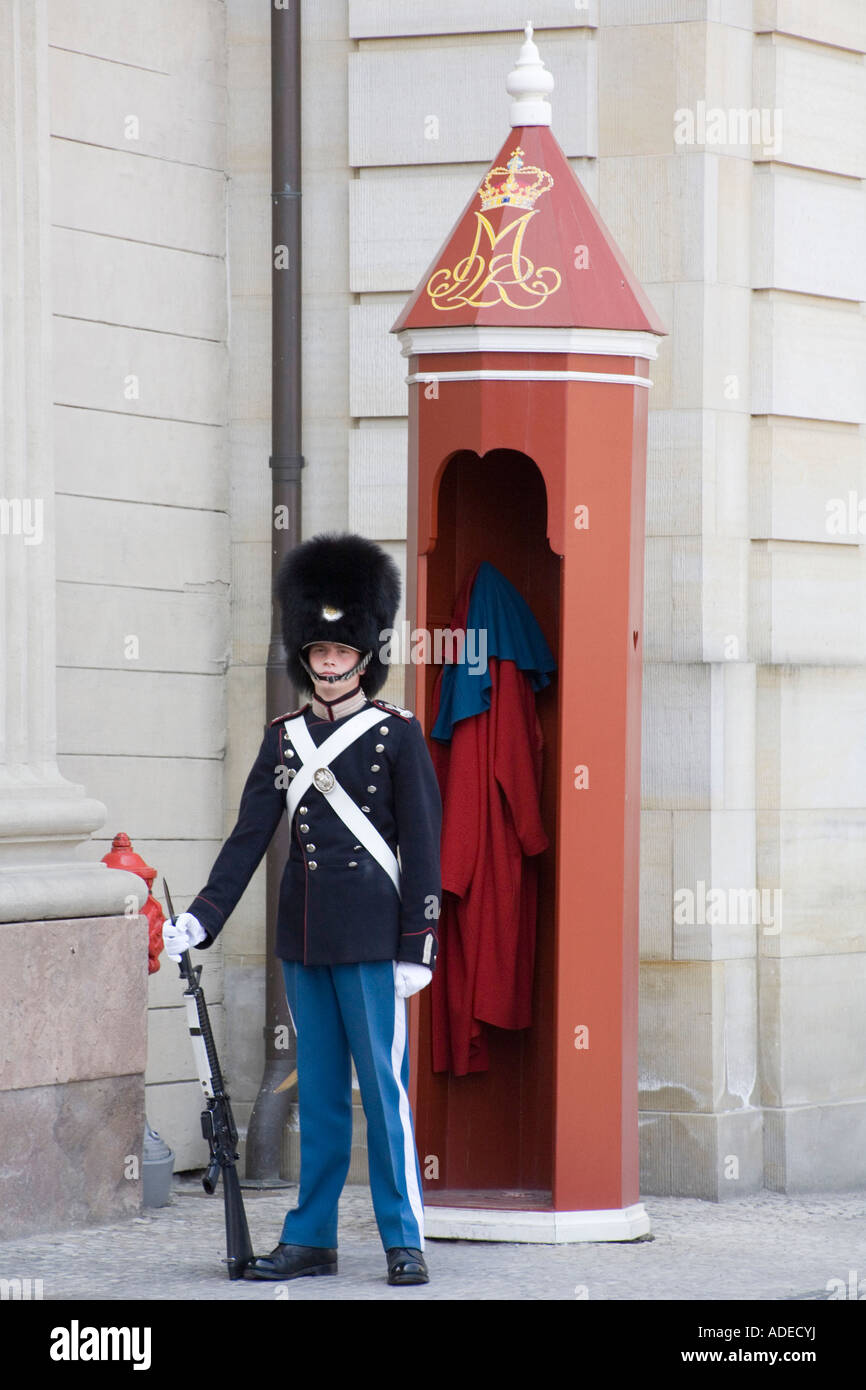 A Danish royal life guard stands outside Amalienborg Royal Palace ...