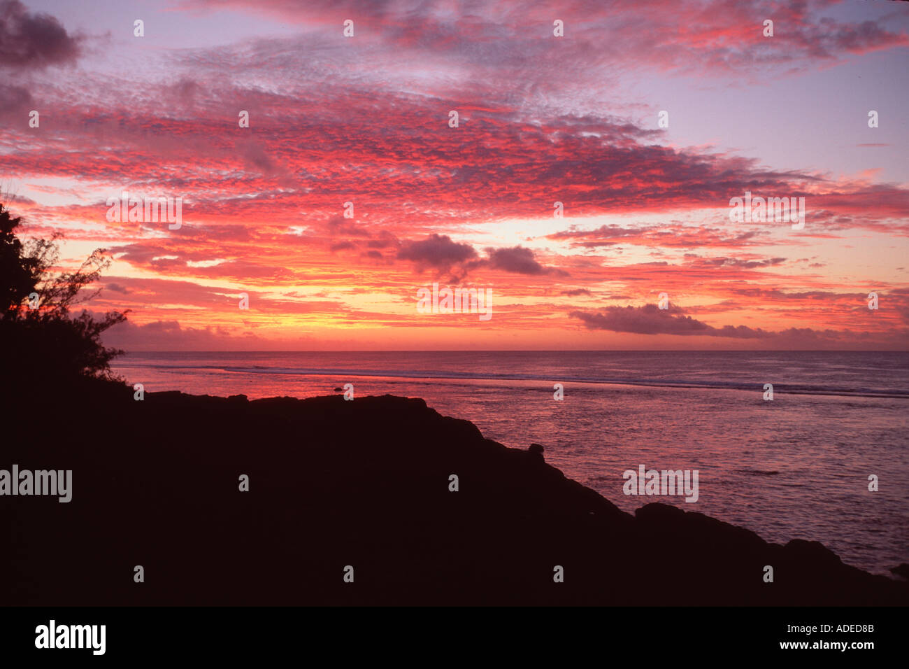 Sunset by the sea Rarotonga Cook Islands South Pacific Stock Photo - Alamy