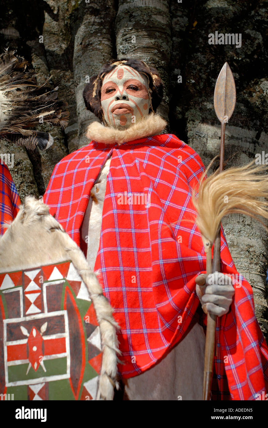 Portrait of Kikuyu dancer in traditional costume of red blanket and ...