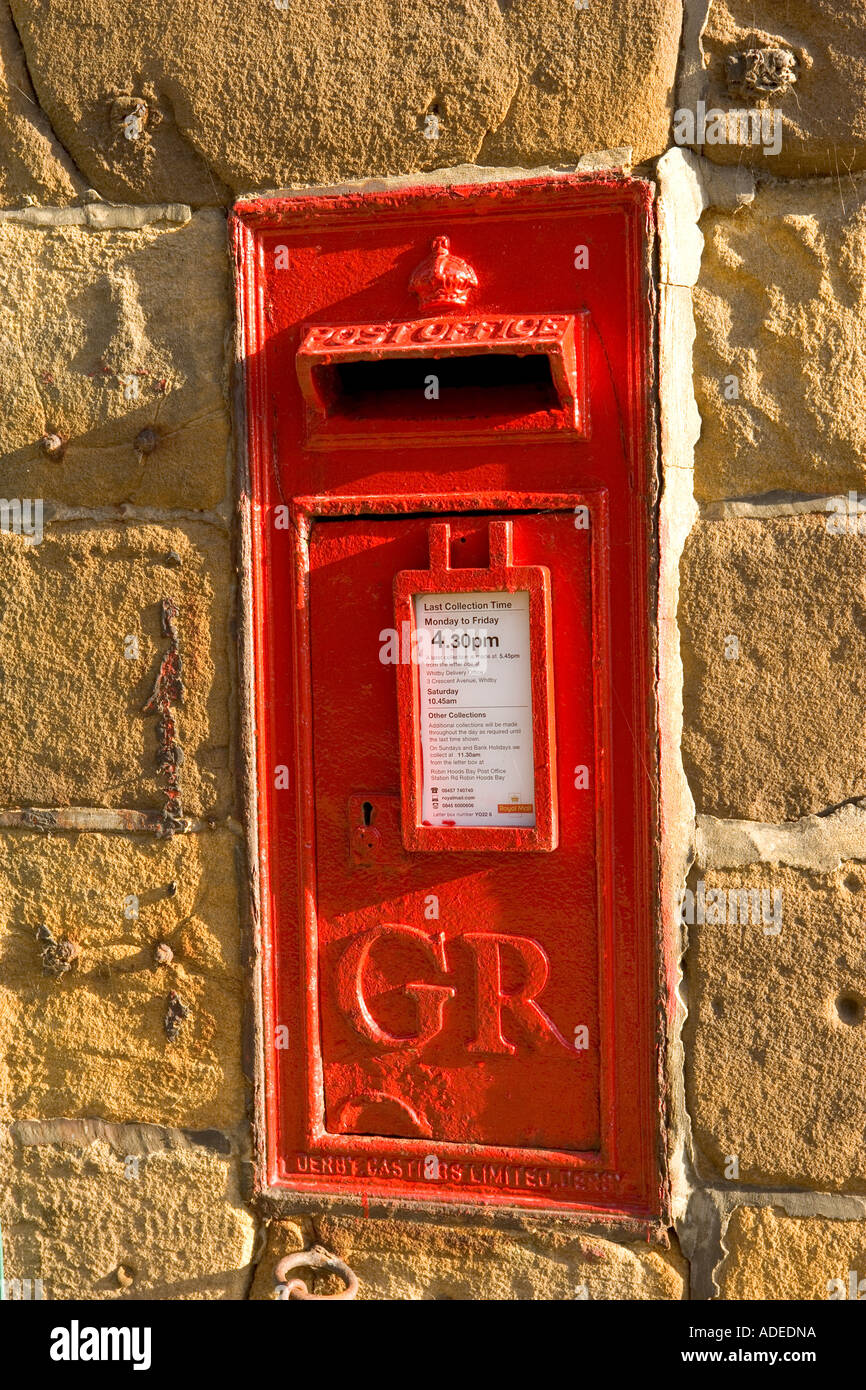 Red Post Box mounted in wall Stock Photo - Alamy