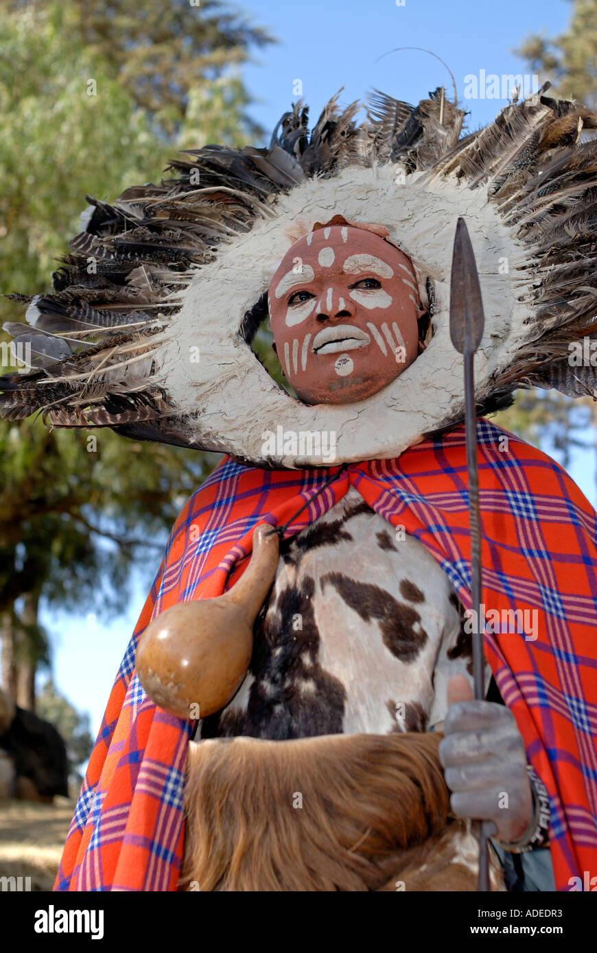 Portrait of Kikuyu dancer in traditional costume of red blanket and ...